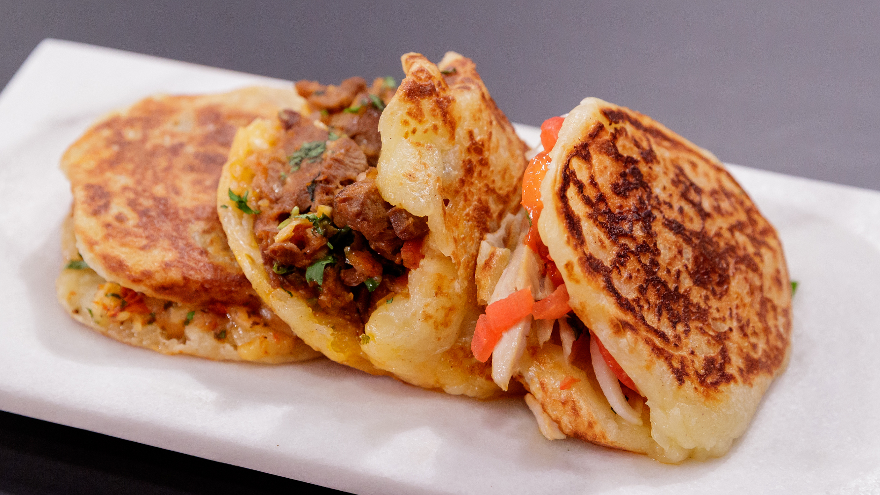 Receta de arepas: queso, secreto ibérico y atún de Fray Marcos